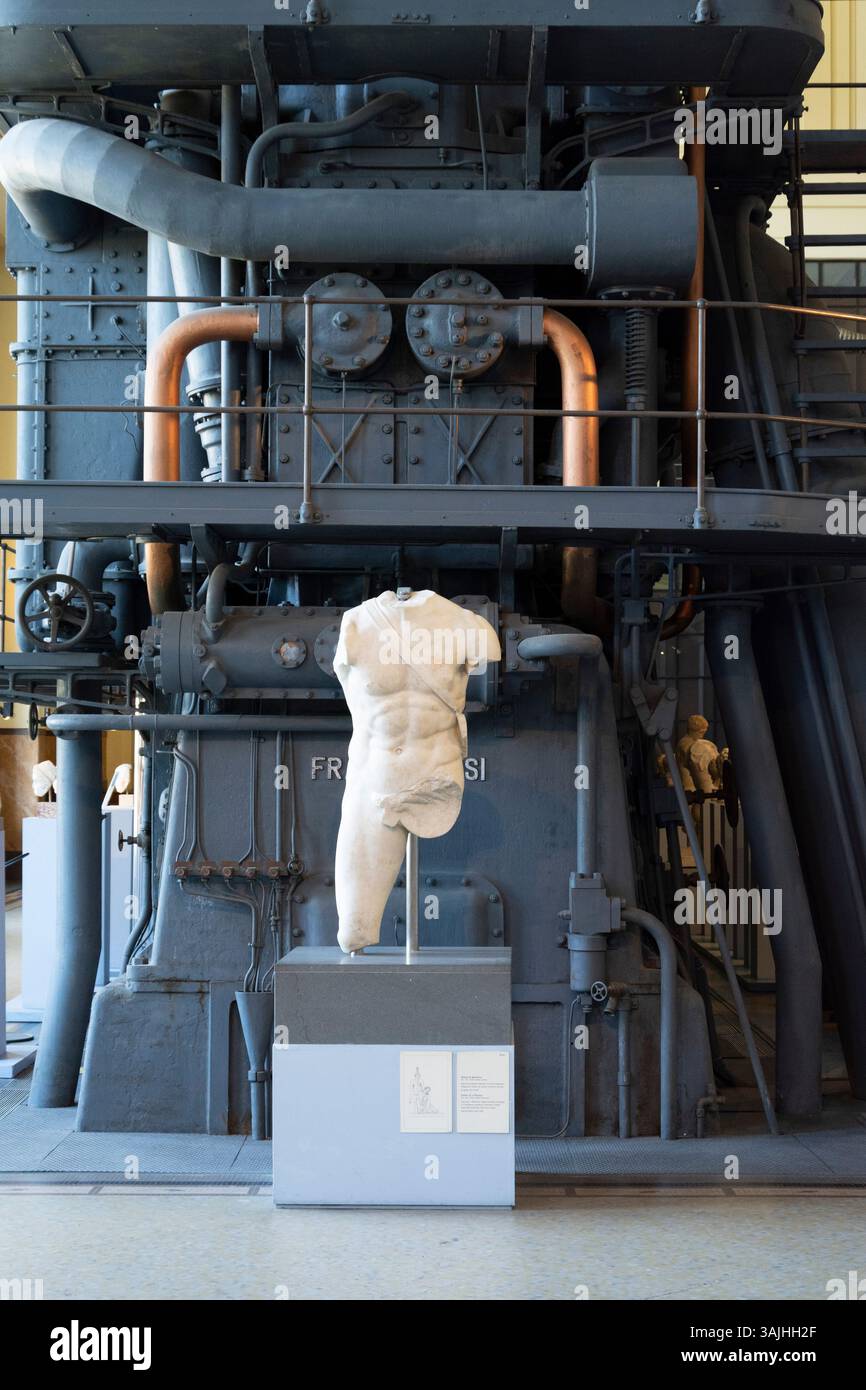 Roman marble statue of a warrior in front of electricity generator ...