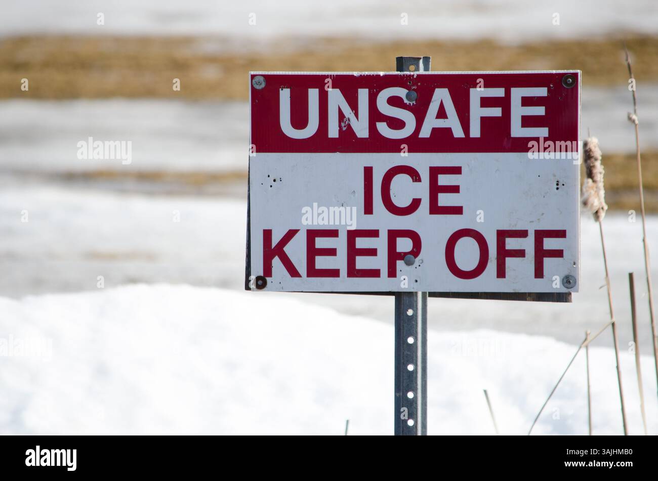 Close-up view of a warning sign to Keep Off Unsafe Ice Stock Photo - Alamy