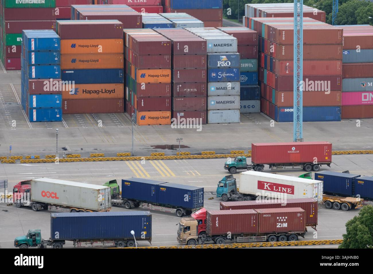 A large cargo port with containers. Unloading and logistics Stock Photo ...