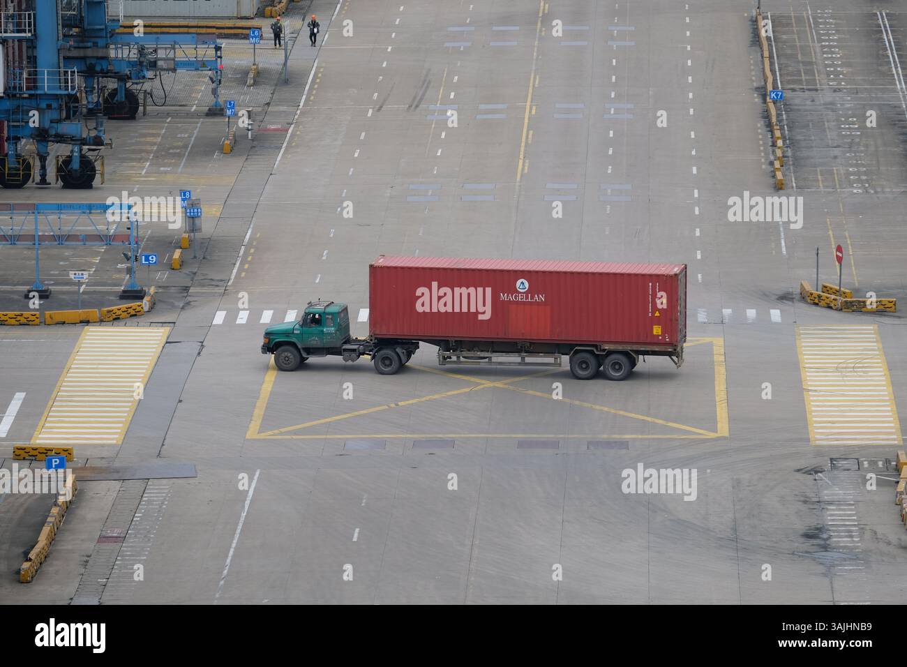 A large cargo port with containers. Unloading and logistics Stock Photo ...