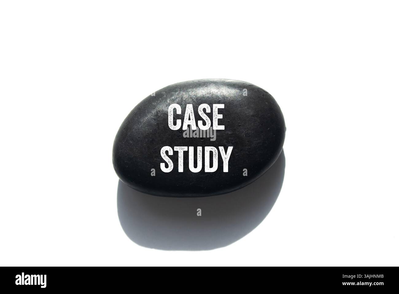 Case study message written on black stone on white background ...