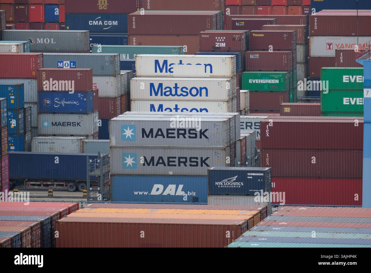 A large cargo port with containers. Unloading and logistics Stock Photo ...