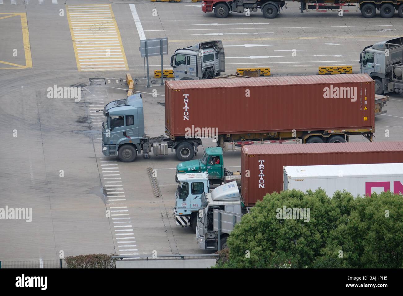 A large cargo port with containers. Unloading and logistics Stock Photo ...