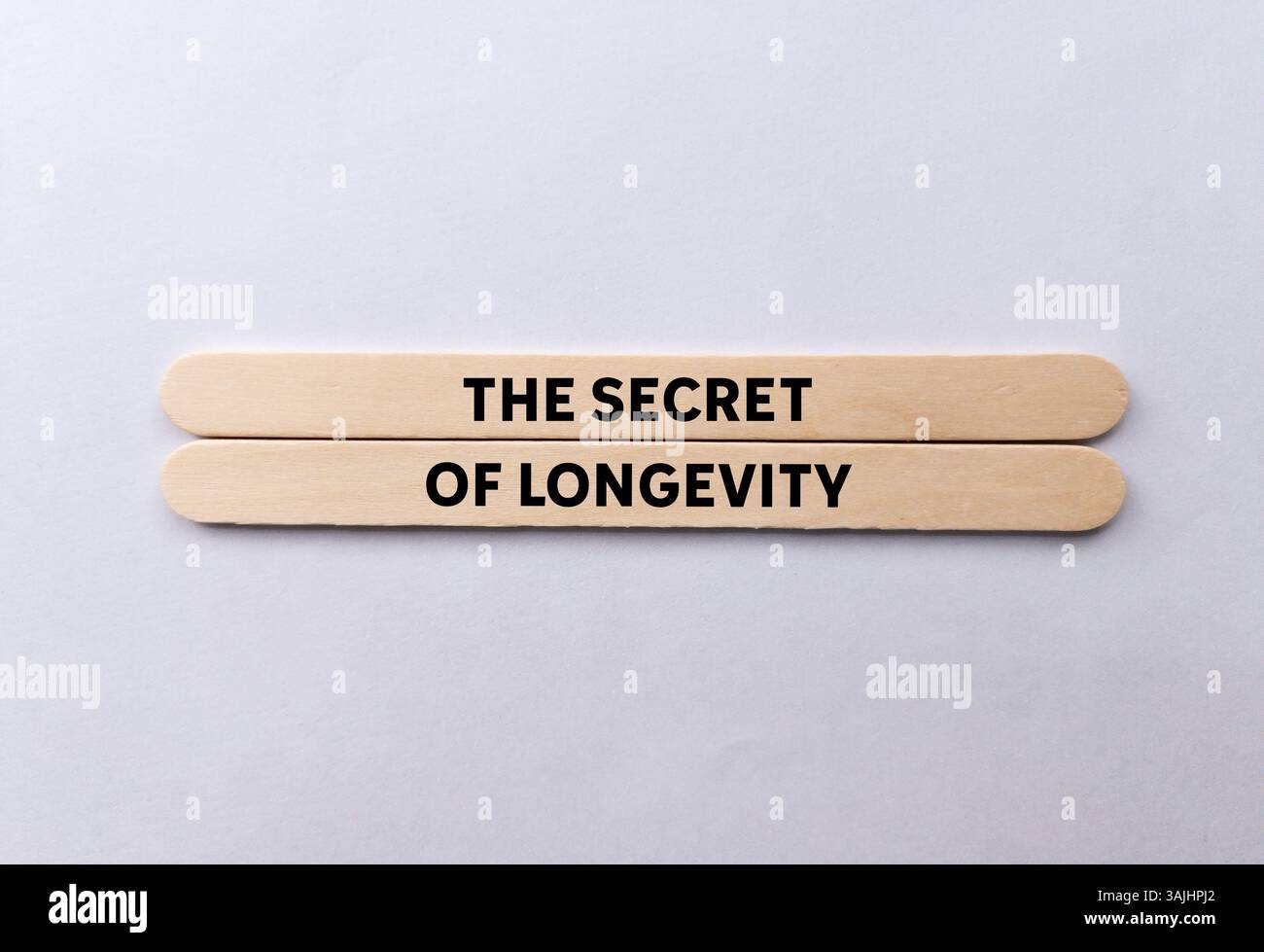 The secret of longevity message written on wooden sticks on white ...