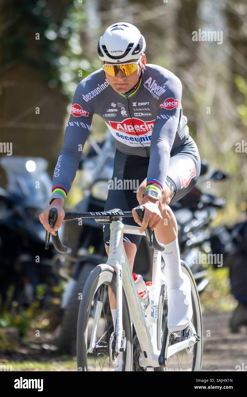 Mathieu Van Der Poet riding through the Arenberg sector during practise ...