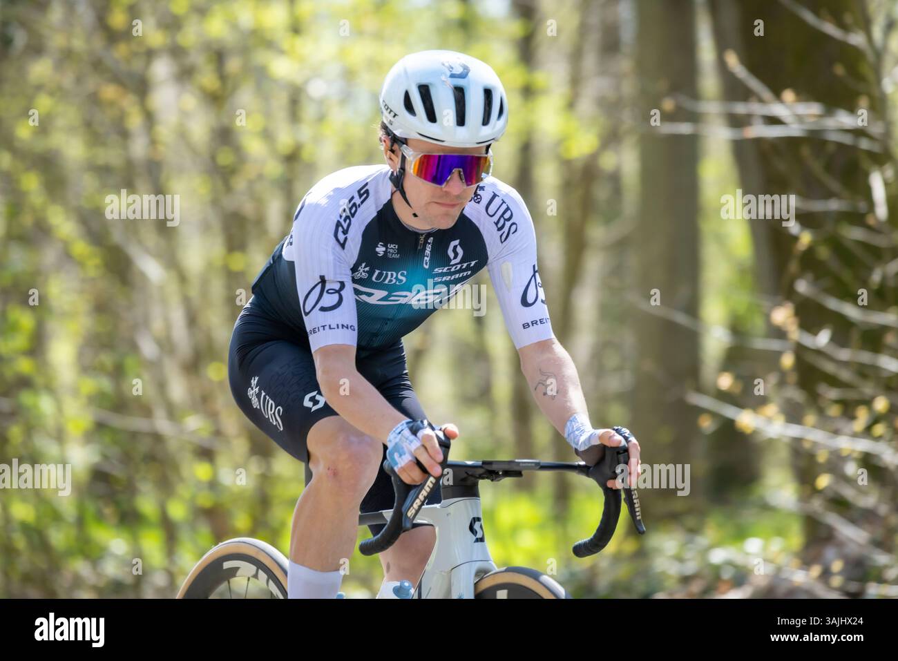 Tom Pidcock riding through the Arenberg sector during practise for ...