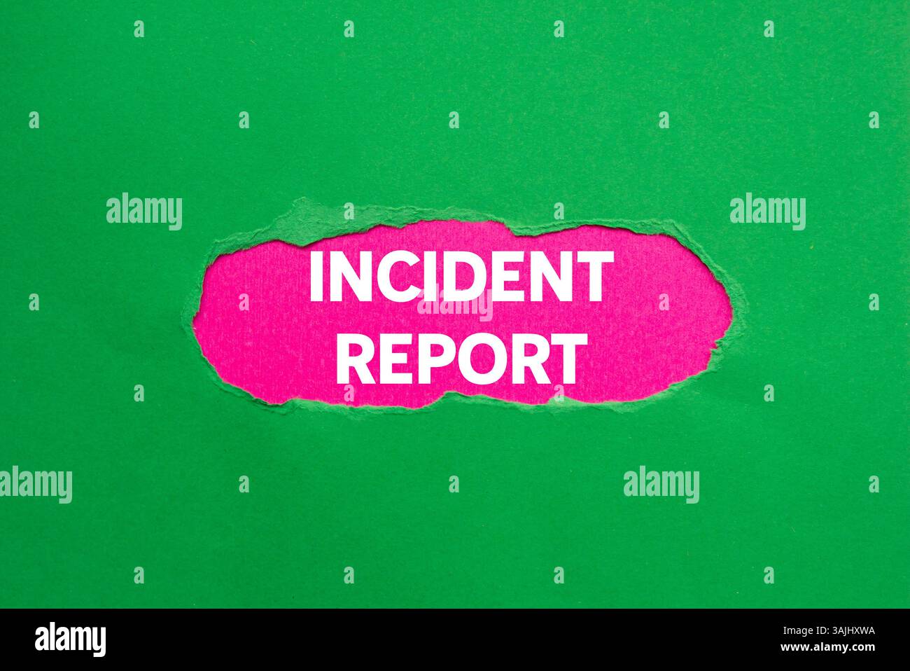 Incident report message written on ripped torn green paper on pink background. Conceptual ...