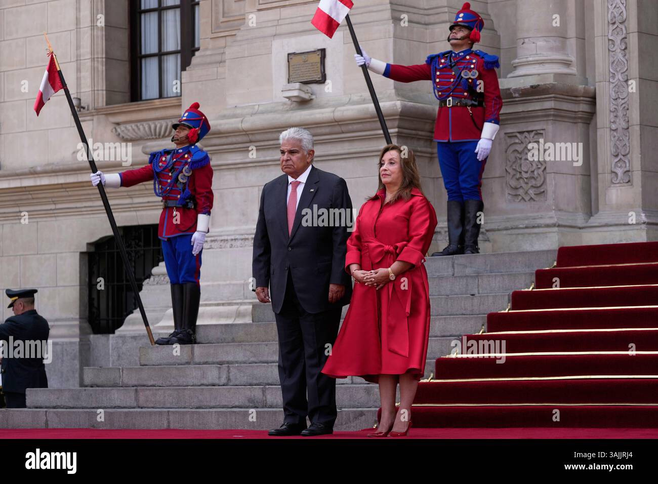 Panama's President Mulino, left, stands with Peruvian President ...