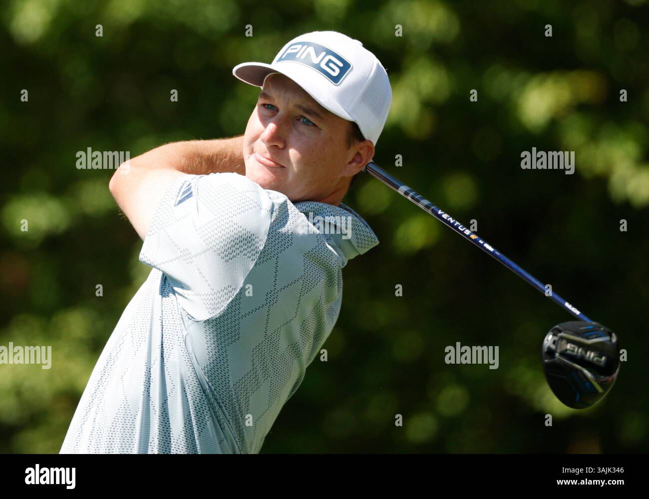 Matt McCarty hits his tee shot on the fourteenth hole during round two ...