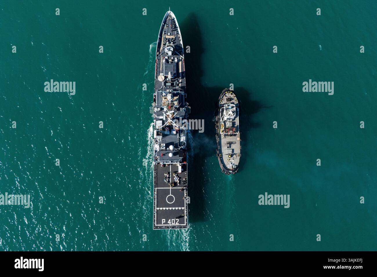The Italian navy ship Libra approaches the port , as Italian ...