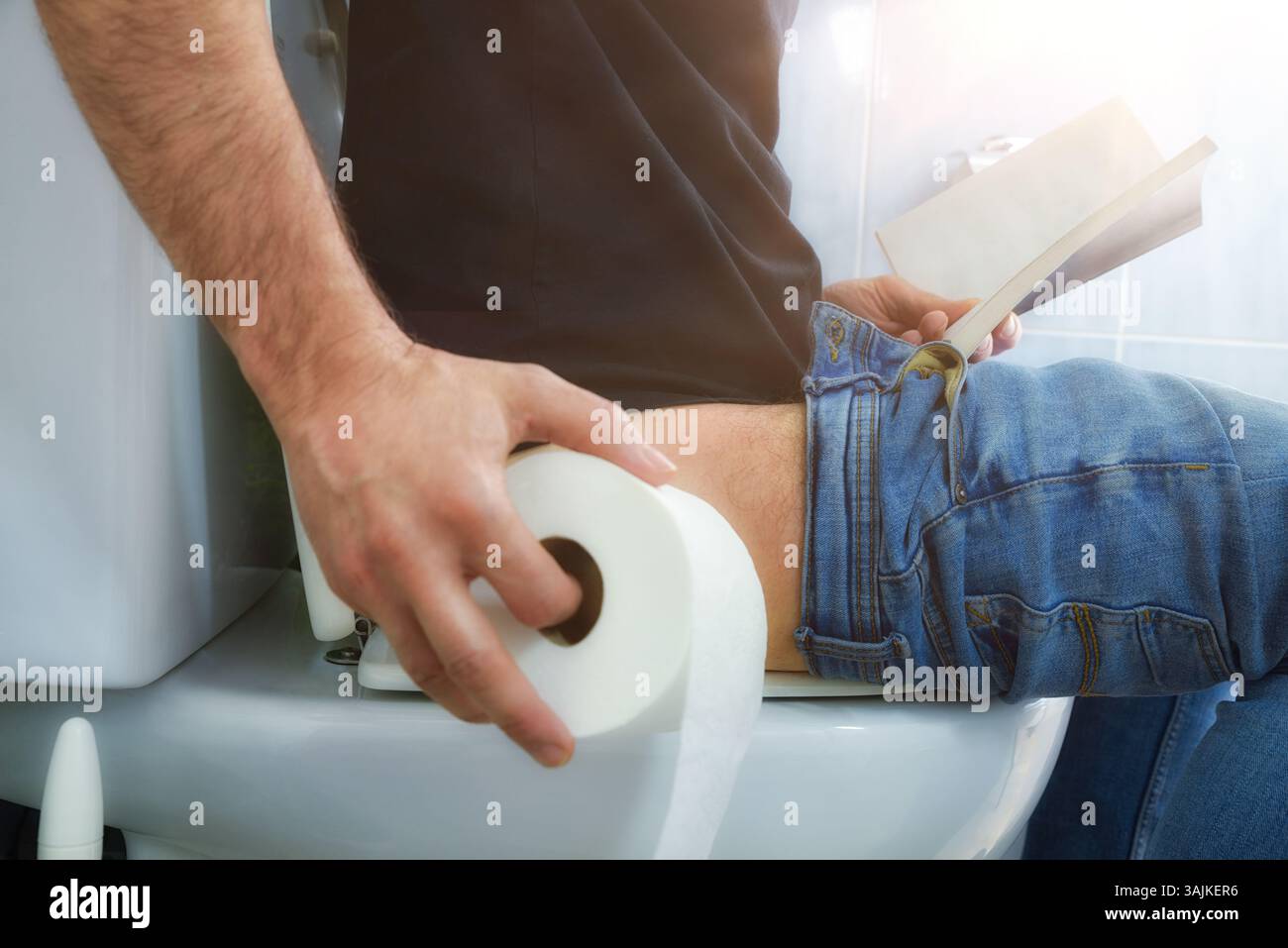 Man on toilet hi-res stock photography and images - Alamy