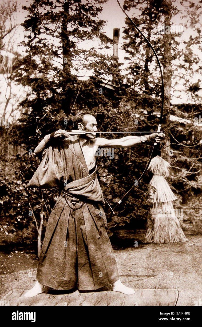 This 1890s photograph shows a kyudo archer drawing a yumi, an ...