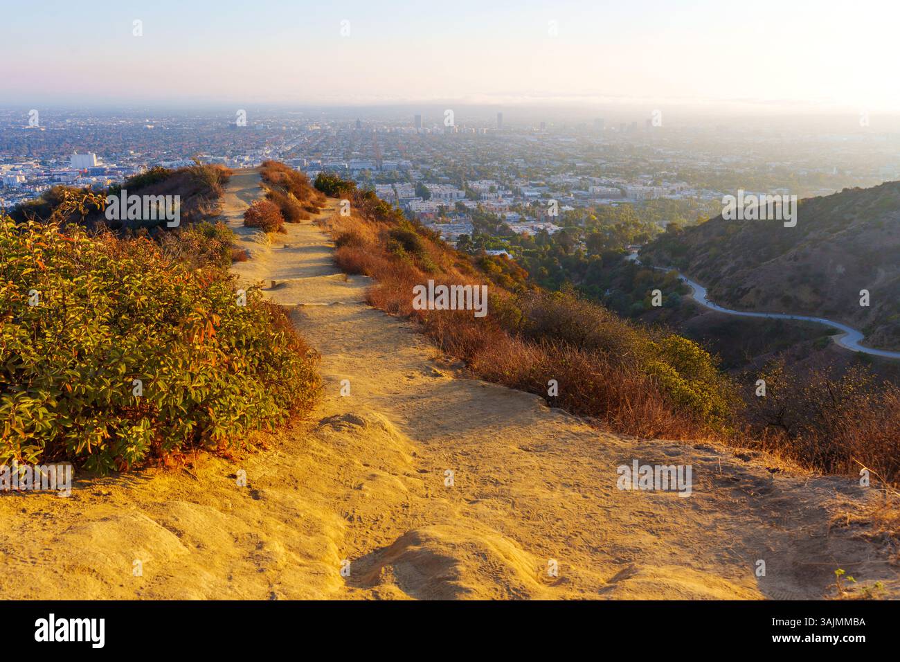 Picturesque hiking trail winds through Runyon Canyon Park, overlooking ...