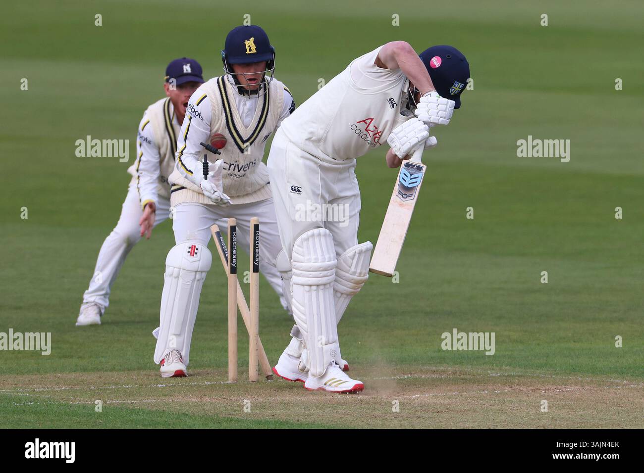 Durham's Will Rhodes is bowled by Warwickshire's Tazeem Ali without ...