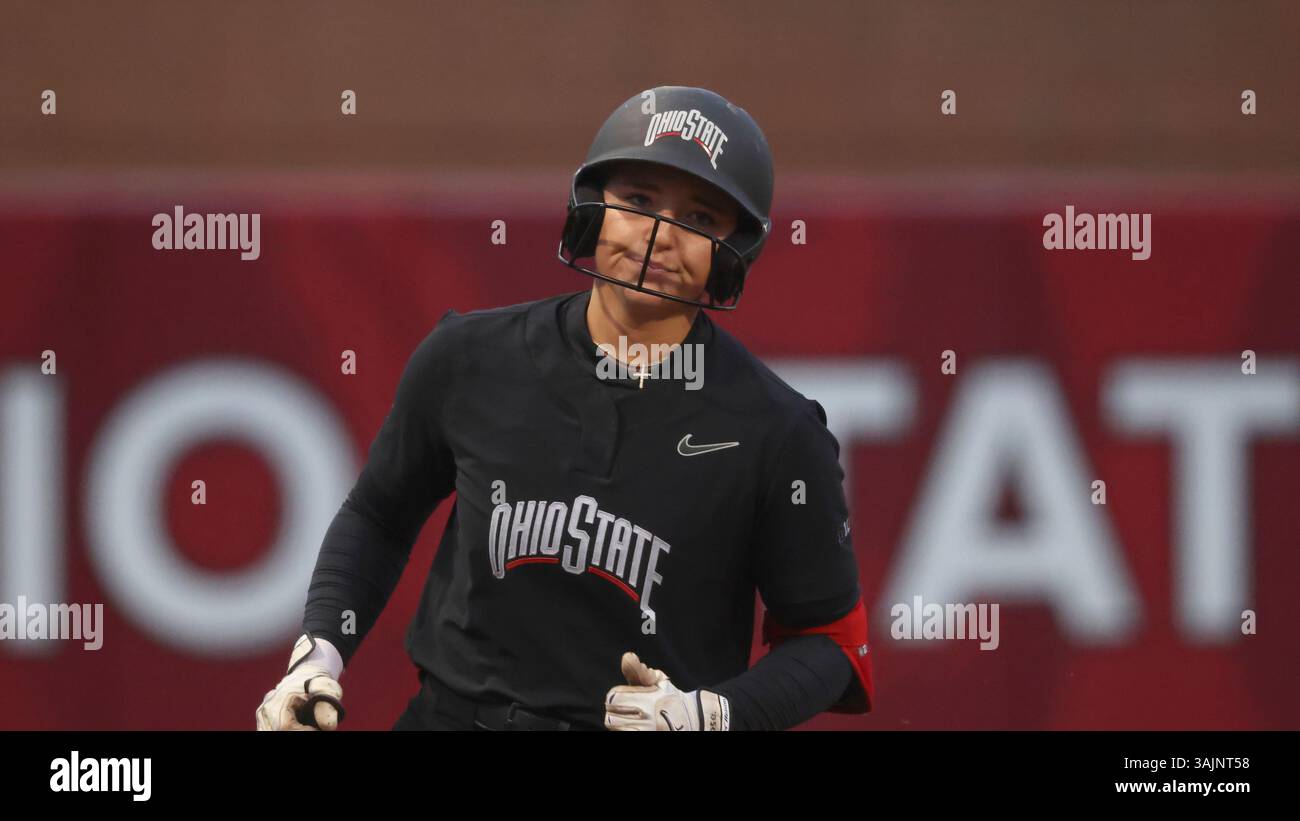 Ohio State infielder Kami Kortokrax (27) runs the bases after hitting a ...