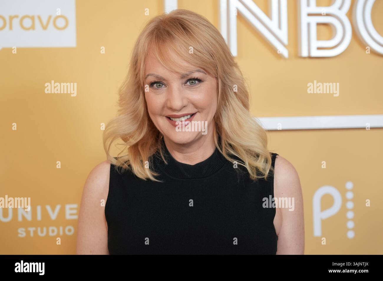 Wendi McLendon-Covey arrives at the NBCU Emmy luncheon on Friday, April ...