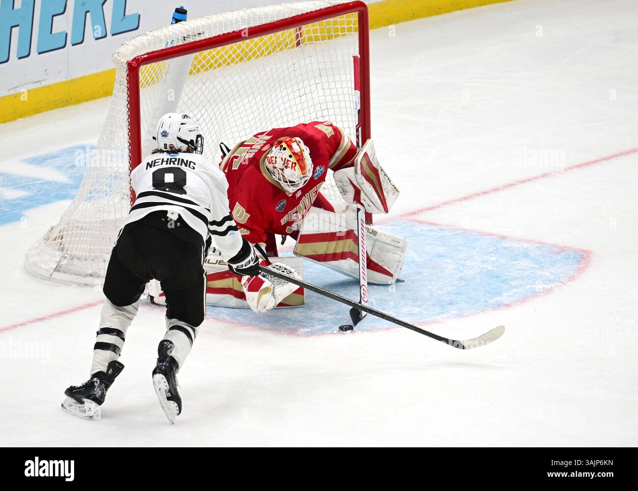 ST. LOUIS, MO - APRIL 10: Denver goaltender Matt Davis (35) blocks a ...