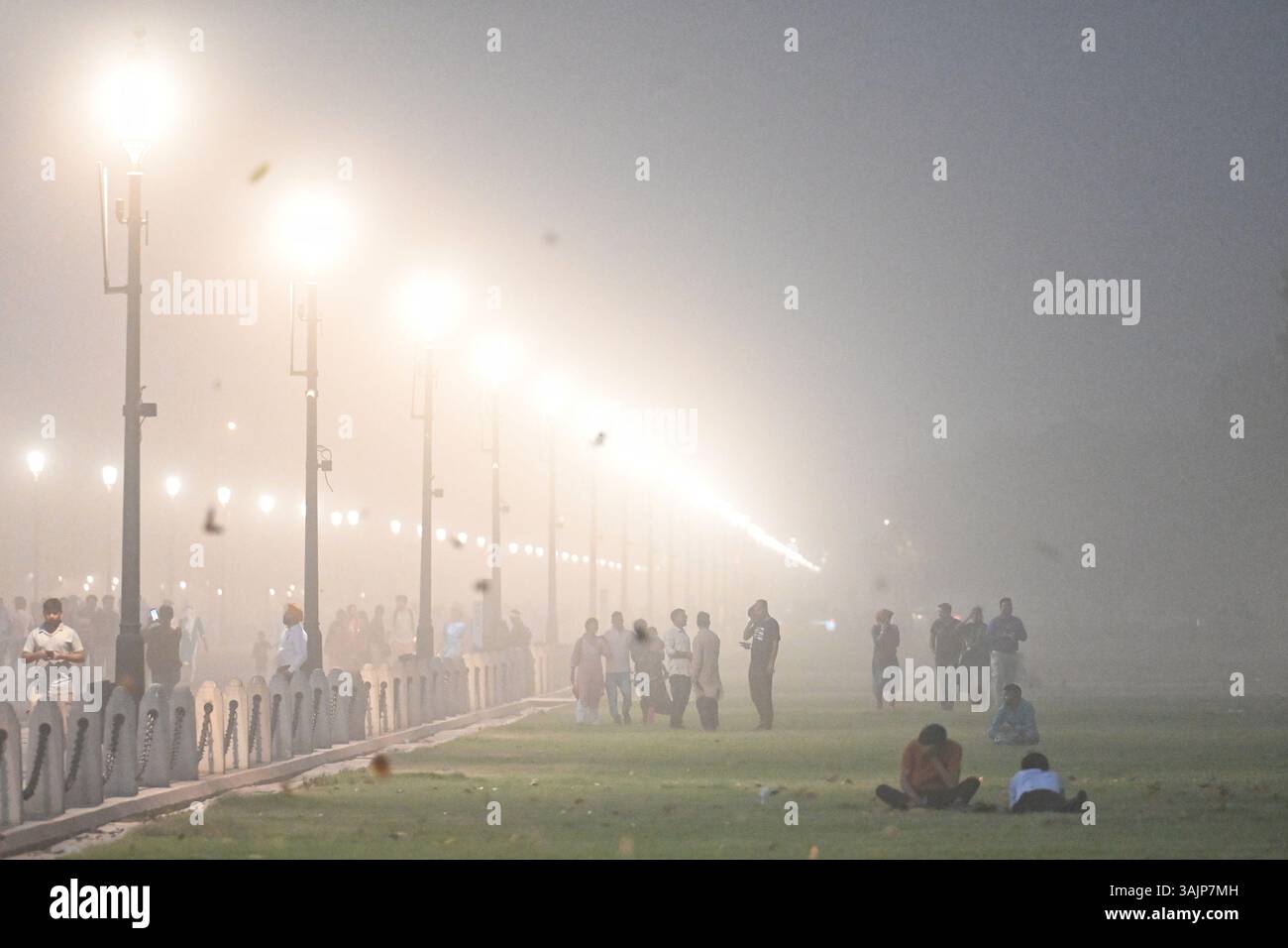 NEW DELHI, INDIA - APRIL 11: Tourists seen during a severe dust storm ...