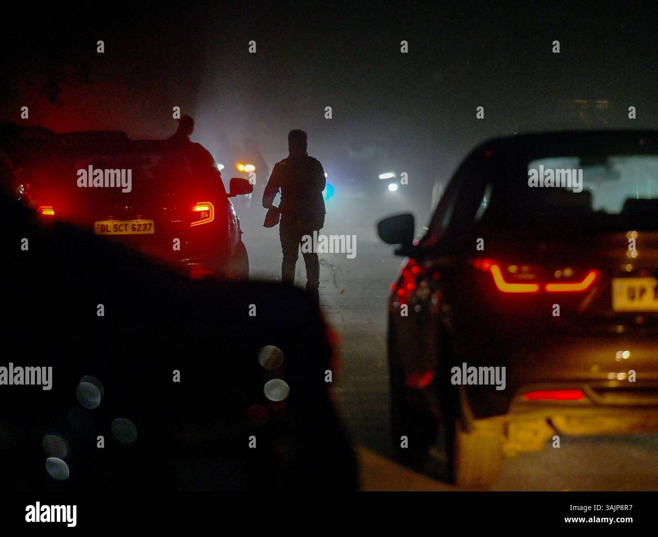 NOIDA, INDIA - APRIL 11: Commuters during a dust storm at Sector 12 ...
