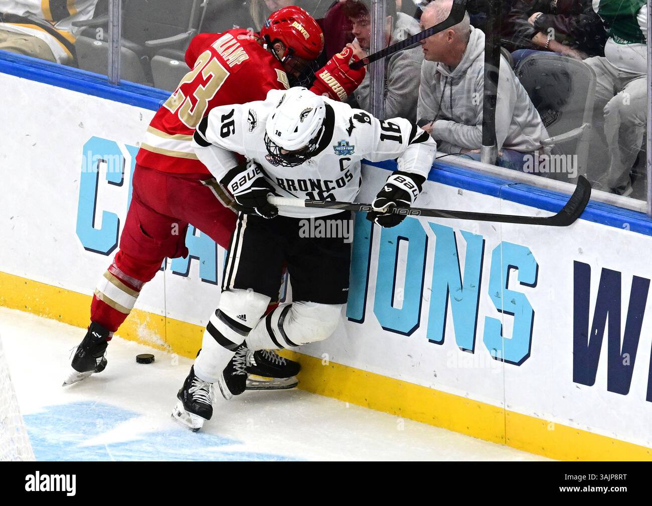 ST. LOUIS, MO - APRIL 10: Denver defenseman Eric Pohlkamp (23) and ...