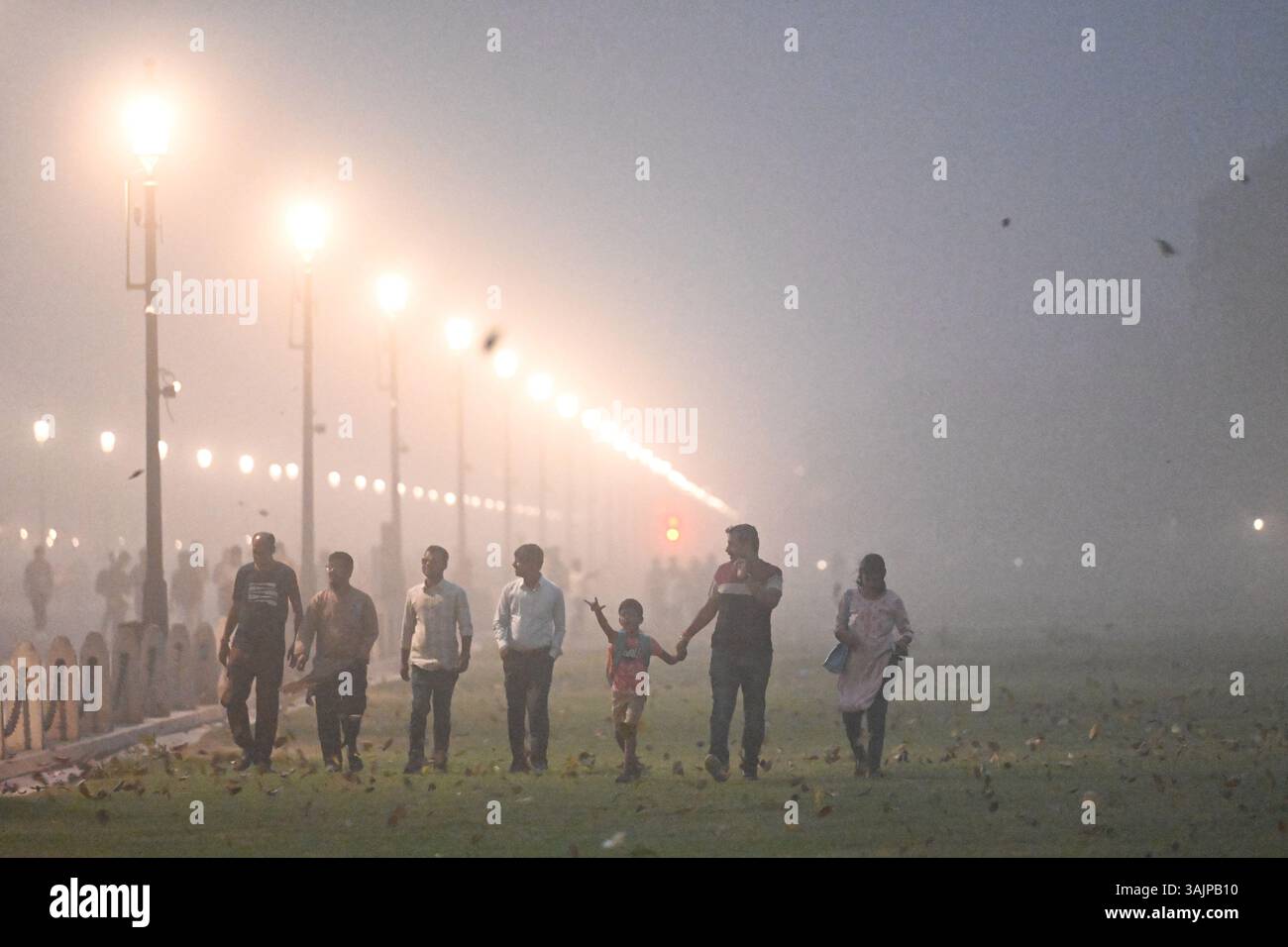NEW DELHI, INDIA - APRIL 11: Tourists seen during a severe dust storm ...