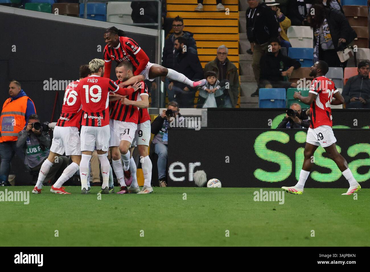 Udine, Italia. 11th Apr, 2025. AC Milan's Strahinja Pavlovic celebrates ...