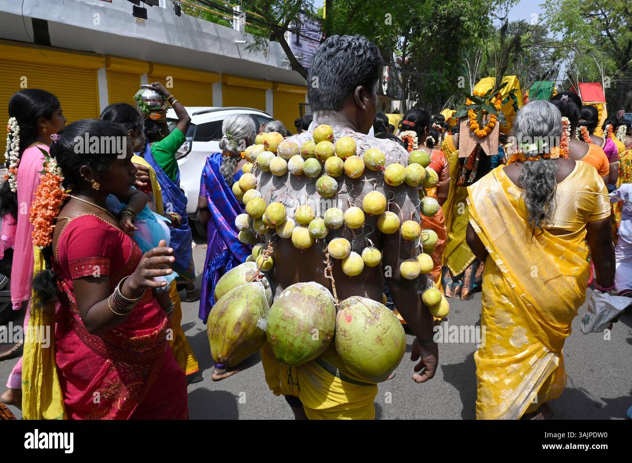 NEW DELHI, INDIA - APRIL 11: People with their cheeks implanted with a ...