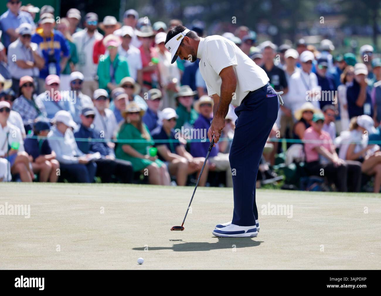 Augusta, United States. 11th Apr, 2025. Jason Day of Australia putts on ...