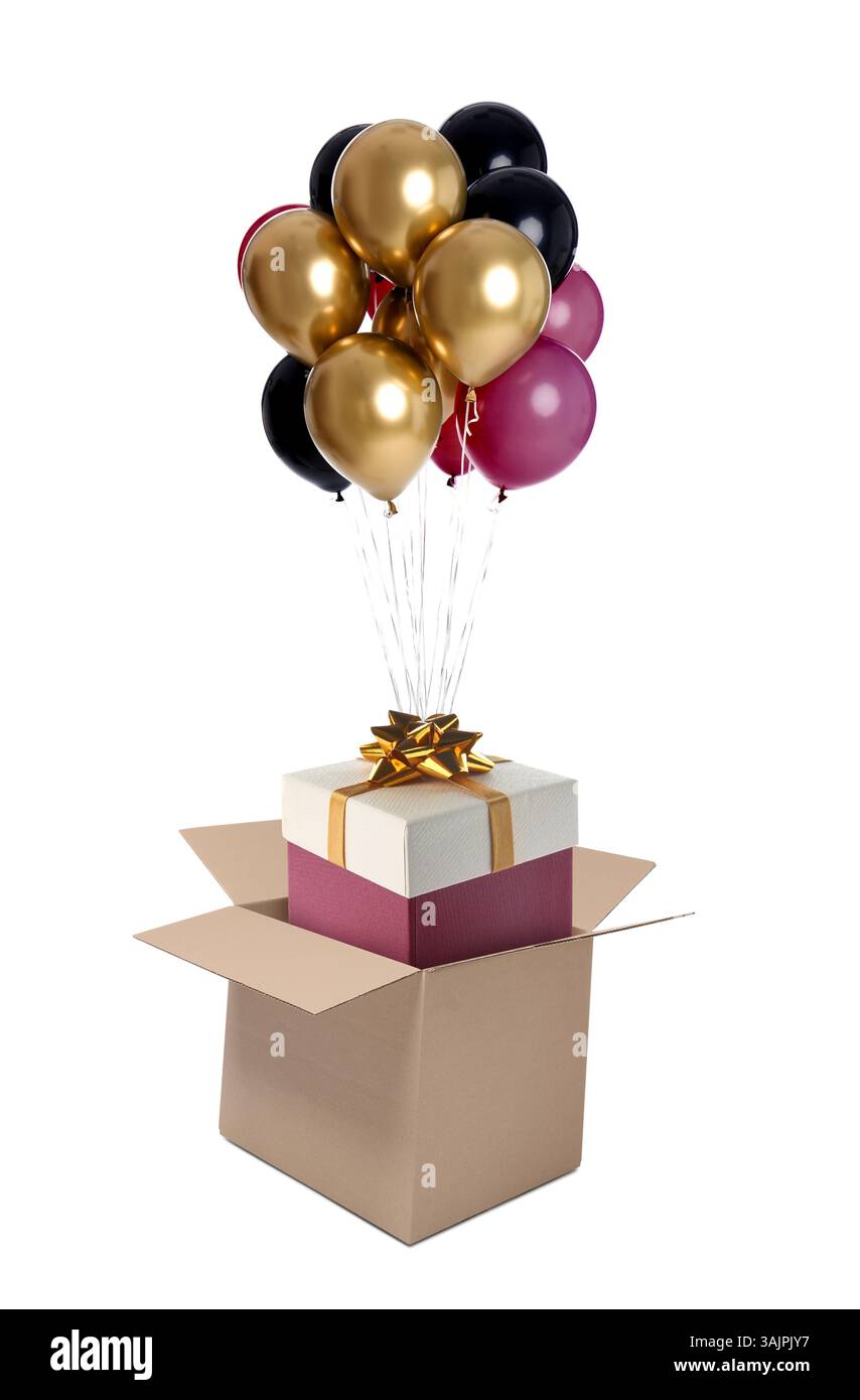 Bright balloons with gift flying out of cardboard box on white ...