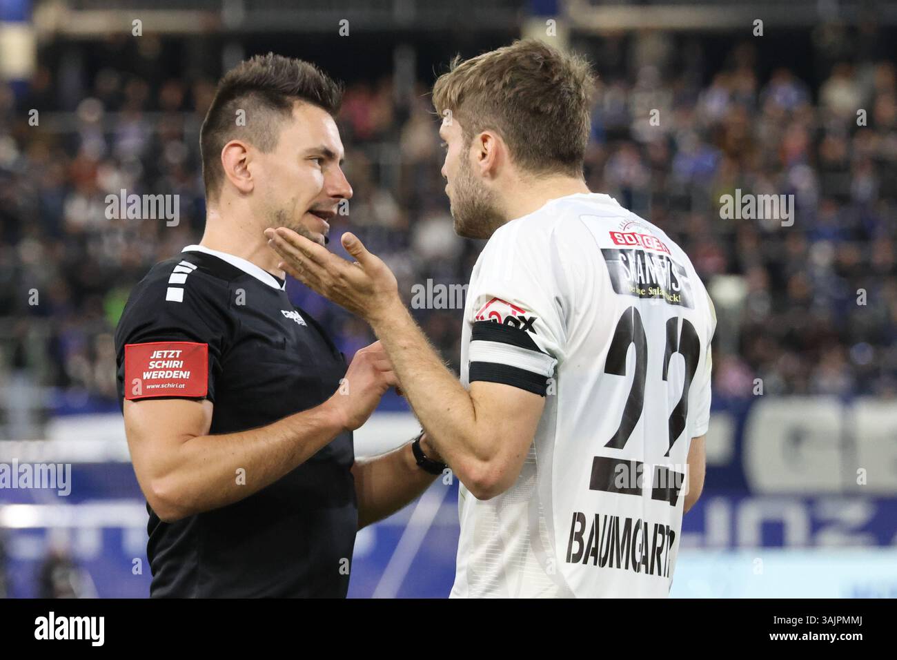 LINZ, AUSTRIA - APRIL 11: referee Alain Sadikovski and Dominik ...