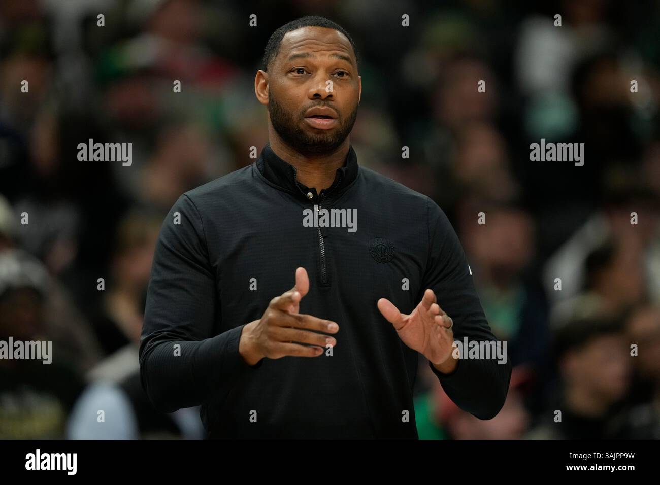 during the first half of an NBA basketball game Thursday, April 10 ...