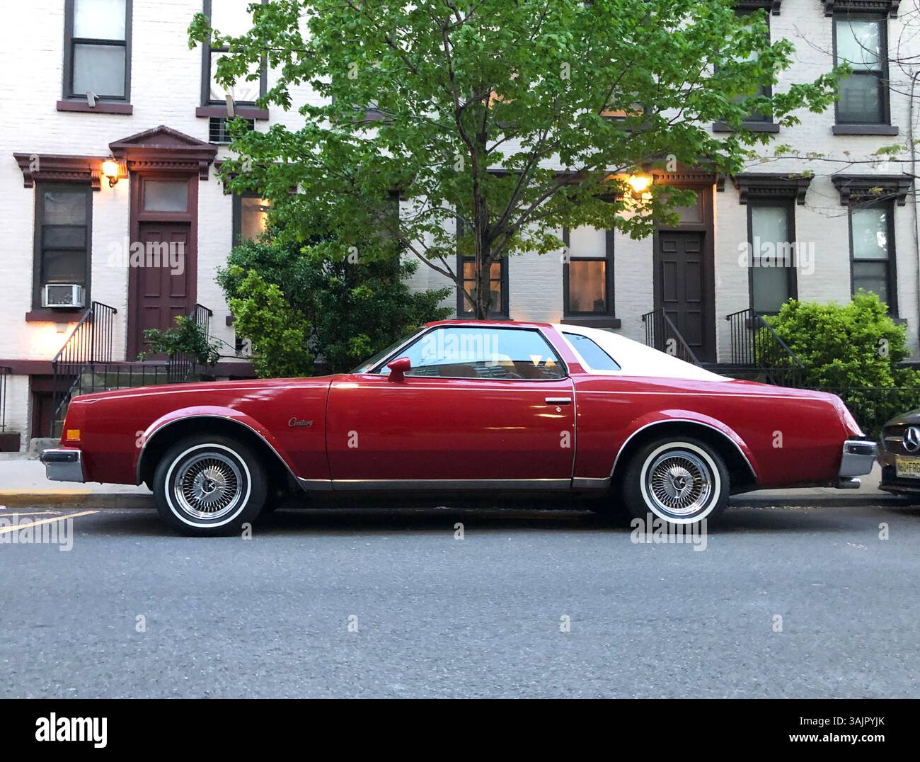retro vintage car on city street with urban background, perfect for ...
