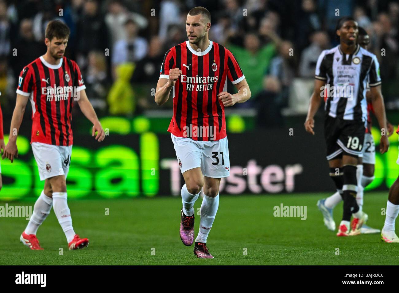 Udine, Italy. 11th Apr, 2025. Milan's Strahinja Pavlovic celebrates ...