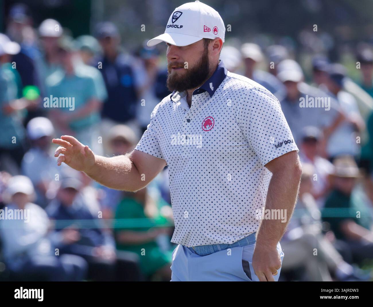 Augusta, United States. 11th Apr, 2025. Tyrrell Hatton of England walks ...