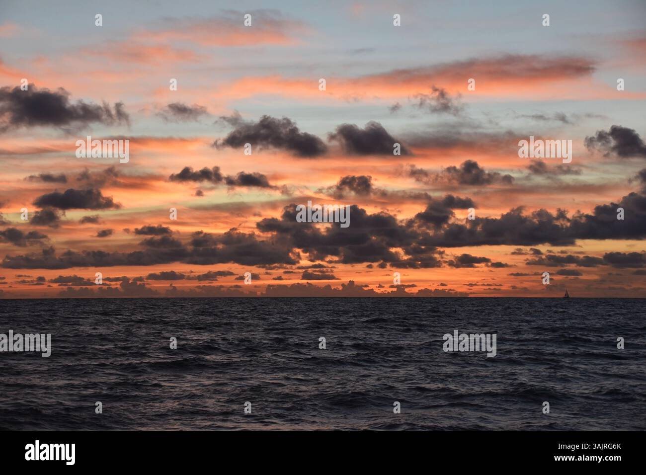 Golden hour over ocean Stock Photo - Alamy