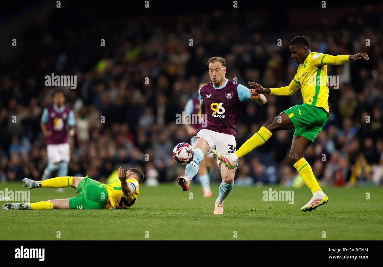 Burnley's Ashley Barnes (centre) and Norwich City's Jose Cordoba (right ...