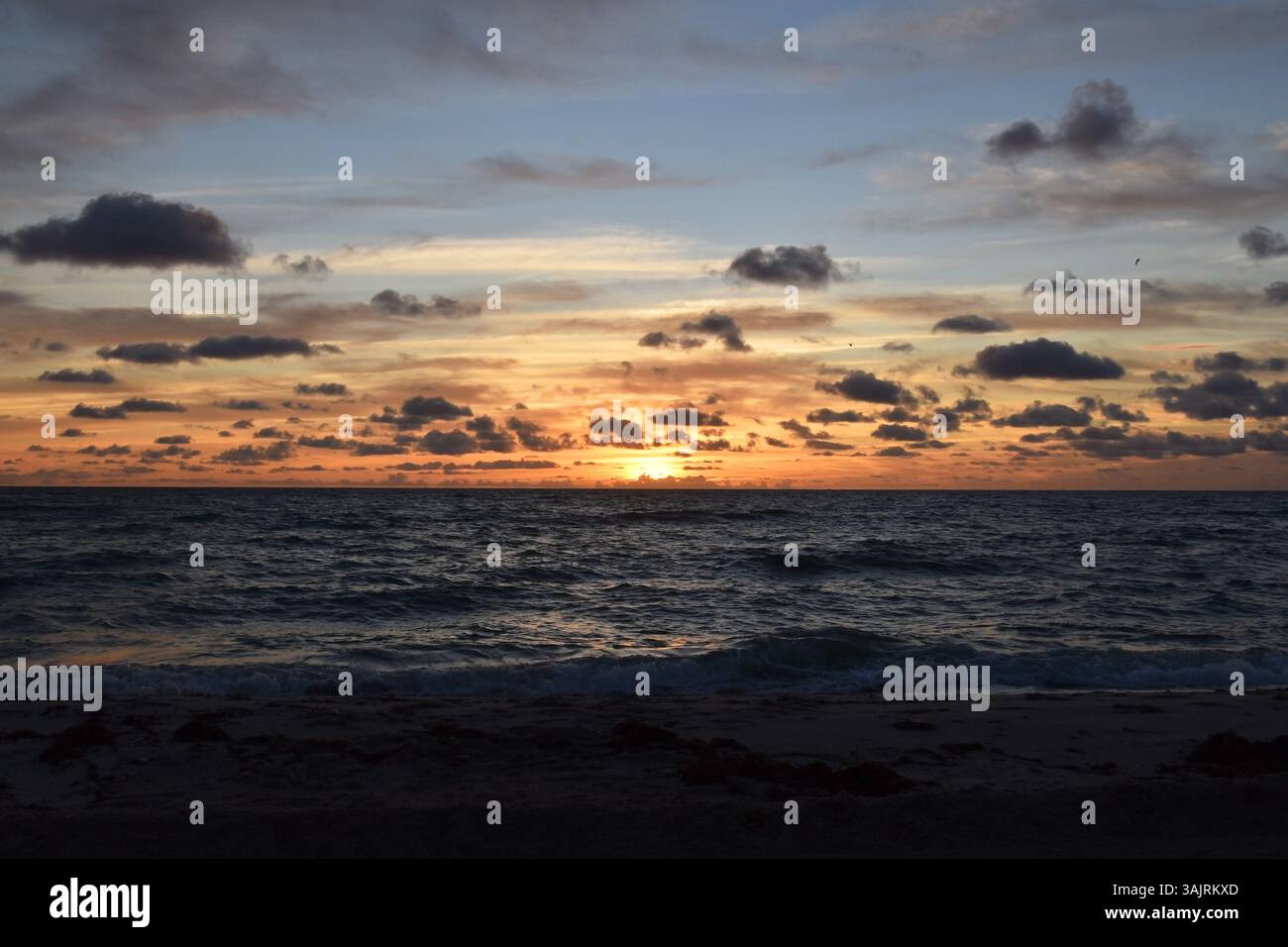 Epic sunrise over ocean Stock Photo - Alamy