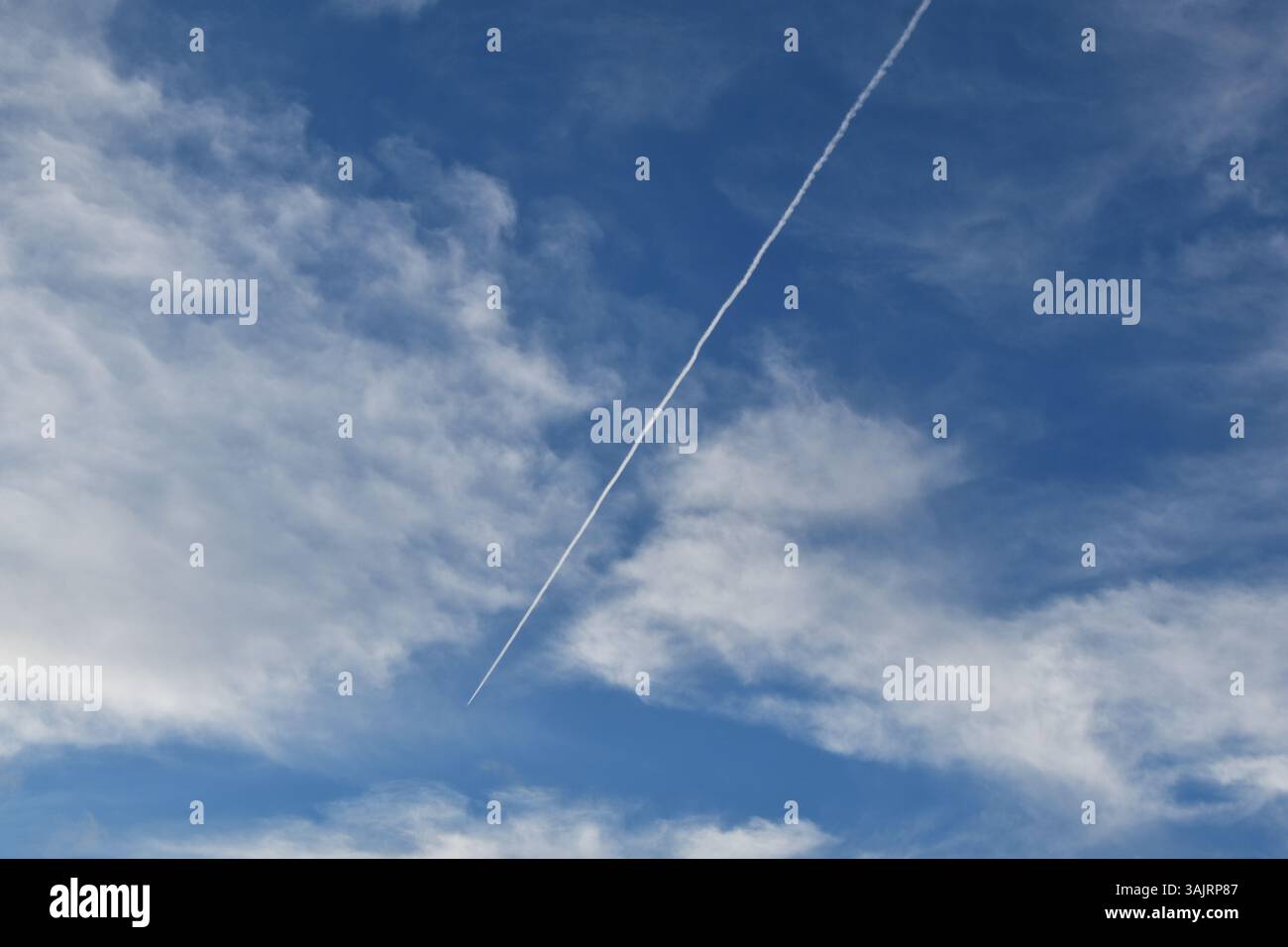 Vibrant sky with white puffy clouds, sunny clear day, tranquil ...