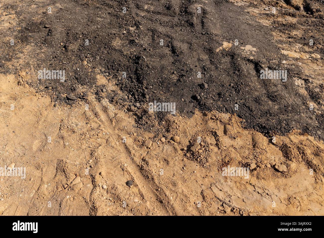 a part of the excavated pits during construction work on the road, the ...