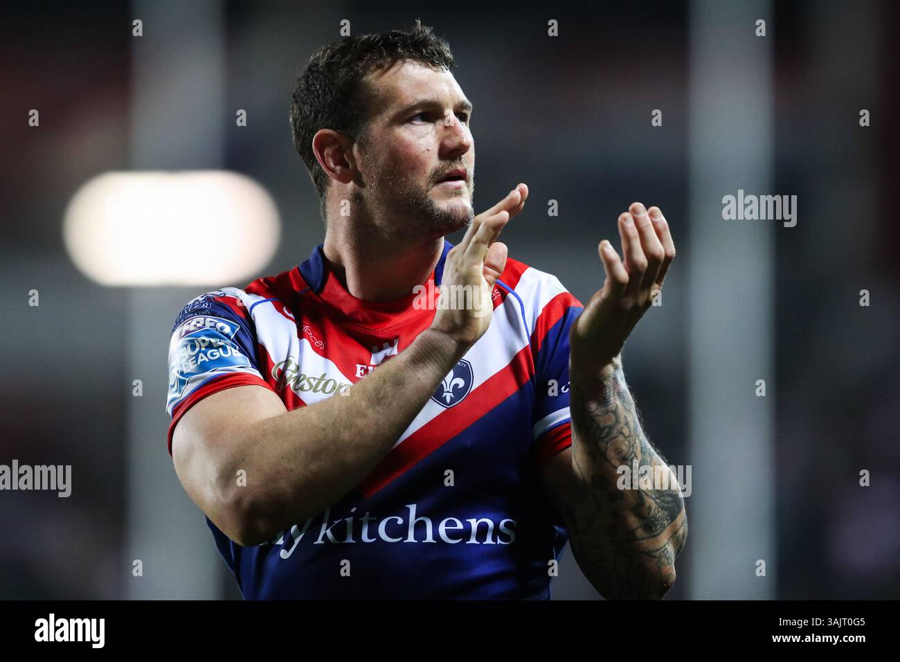 Jay Pitts of Wakefield Trinity applauds the travelling fans after the ...