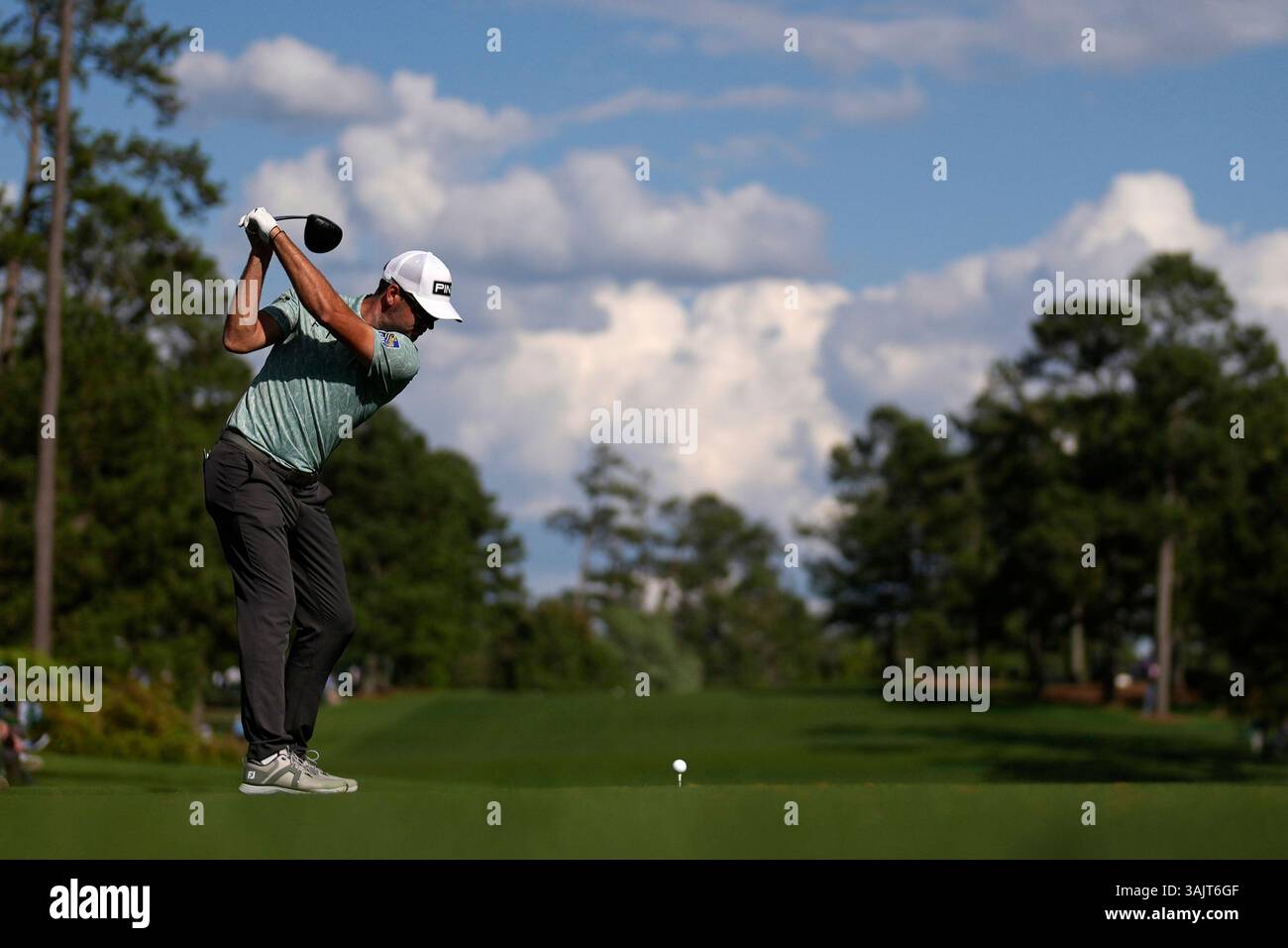 Corey Conners, of Canada, hits his tee shot on the 17th hole during the ...