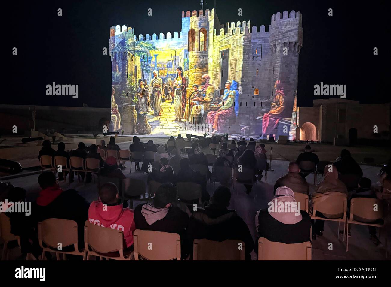 Alexandria, Egypt. 11th Apr, 2025. People watch a sound and light show ...