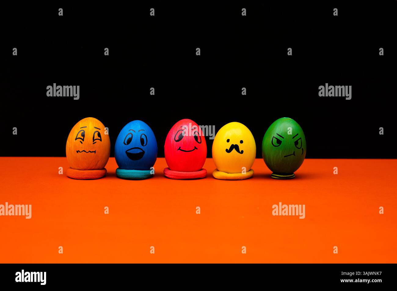 Five brightly colored eggs with distinct hand-drawn expressions ...