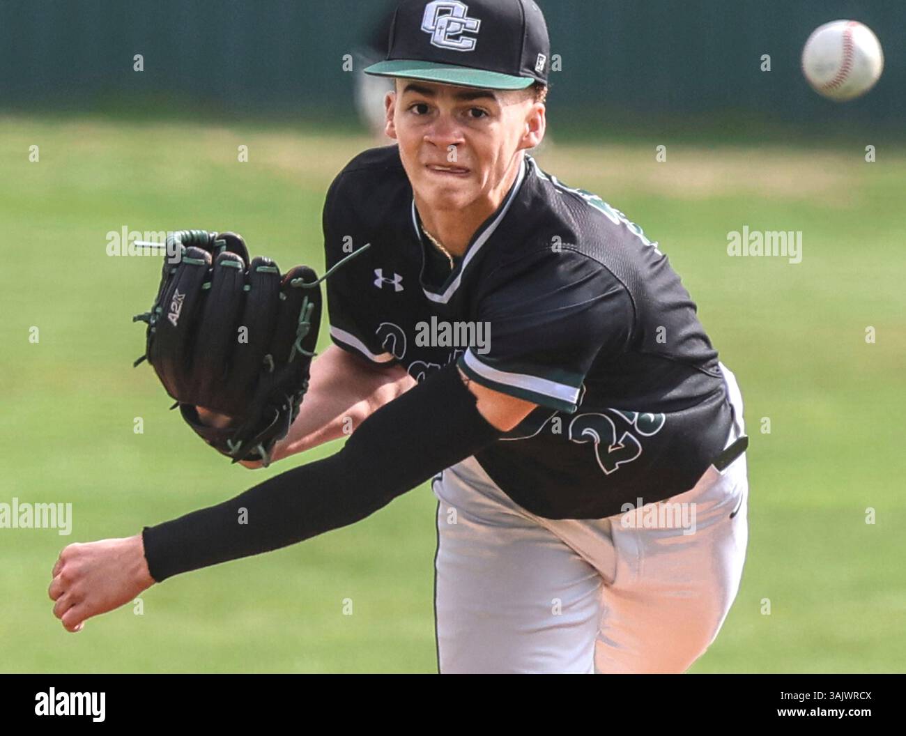 Owensboro Catholic's Jaxson White pitches in the first inning against ...