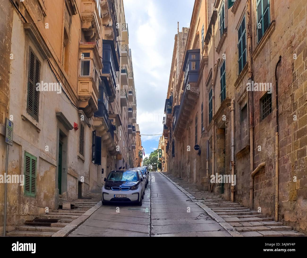 Valletta, Malta - 01. October 2024: White electric cars parked on a ...