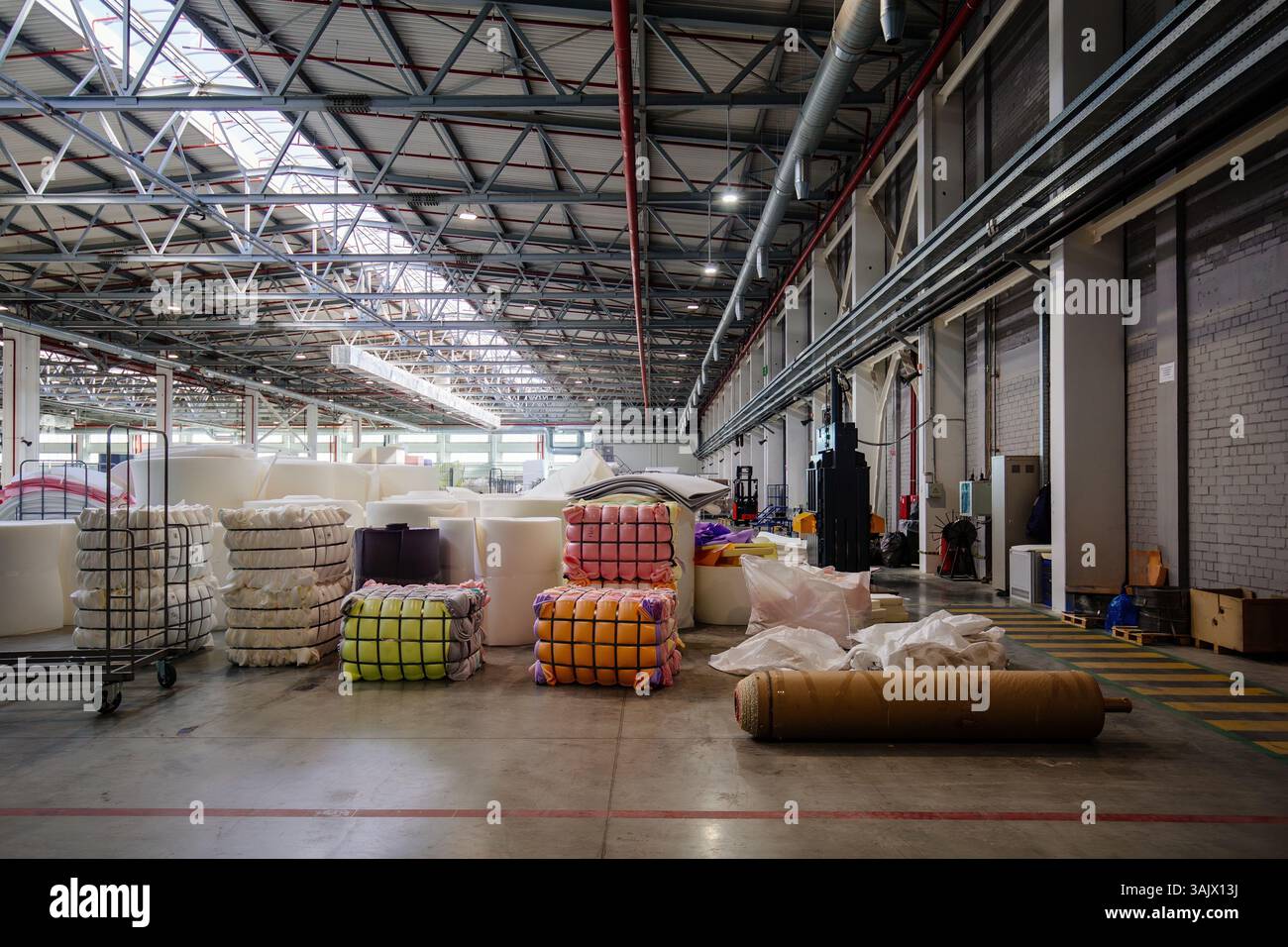 warehouse with packs of foam rubber Stock Photo - Alamy