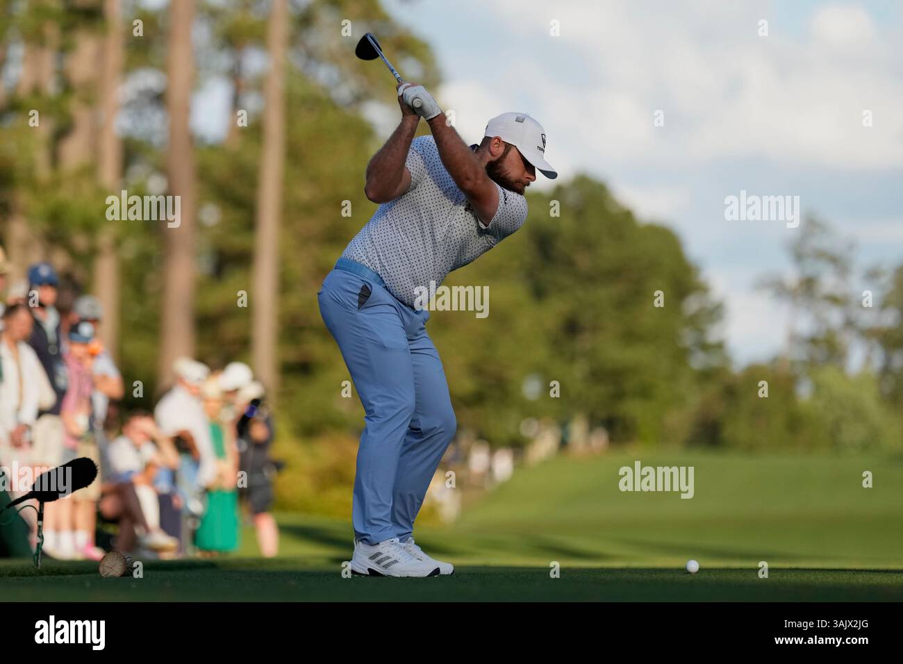 Tyrrell Hatton, of England, hits his tee shot on the 17th hole during ...