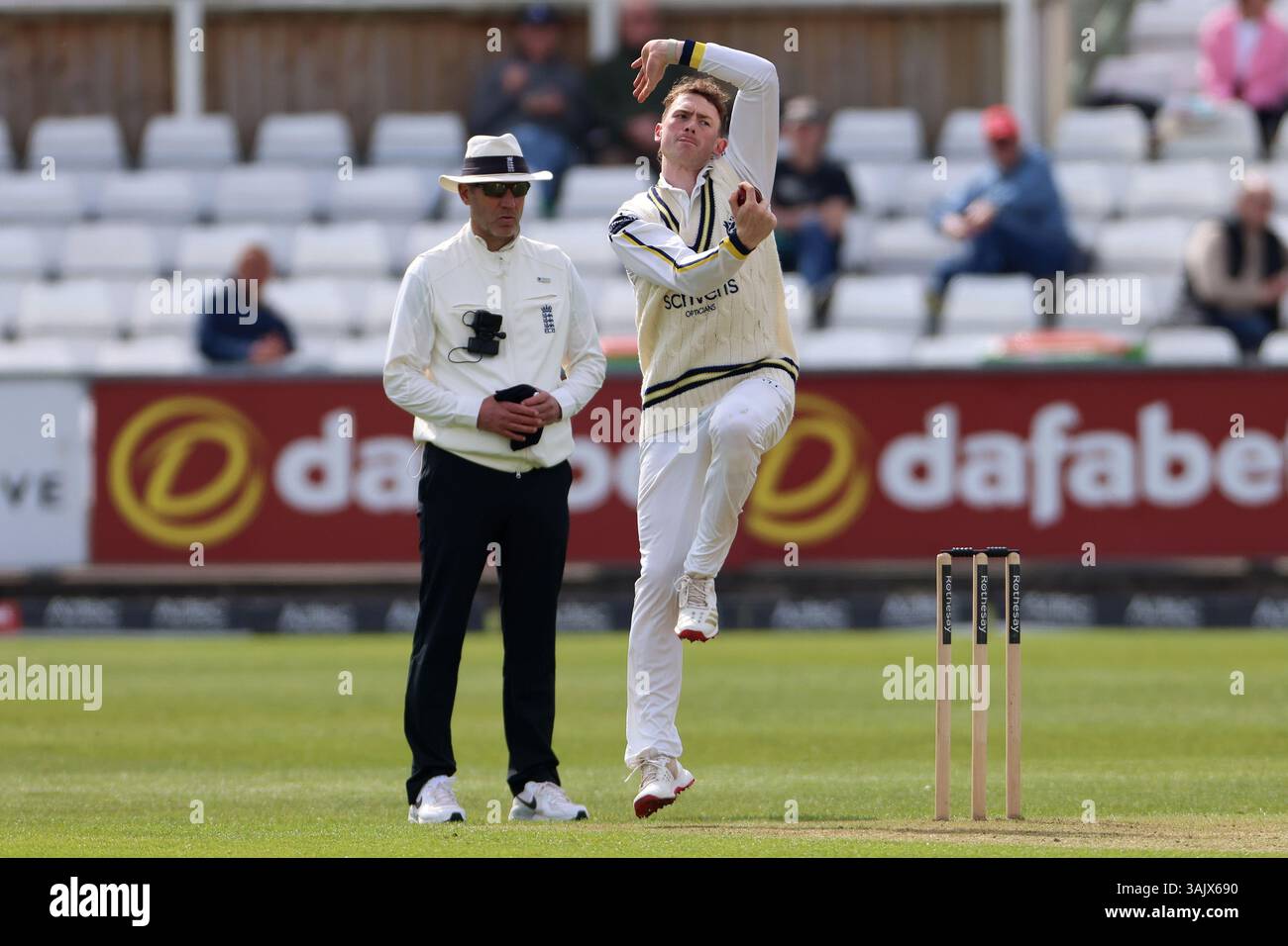 Warwickshire's Rob Yates is seen bowling during the First Day of the ...