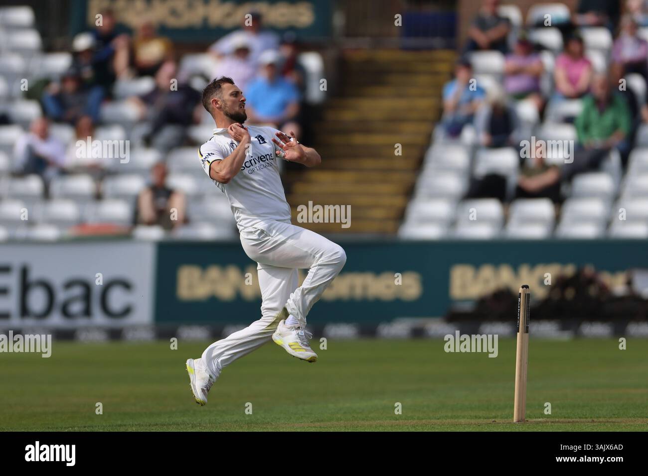 Warwickshire's Ed Barnard is seen bowling during the First Day of the ...