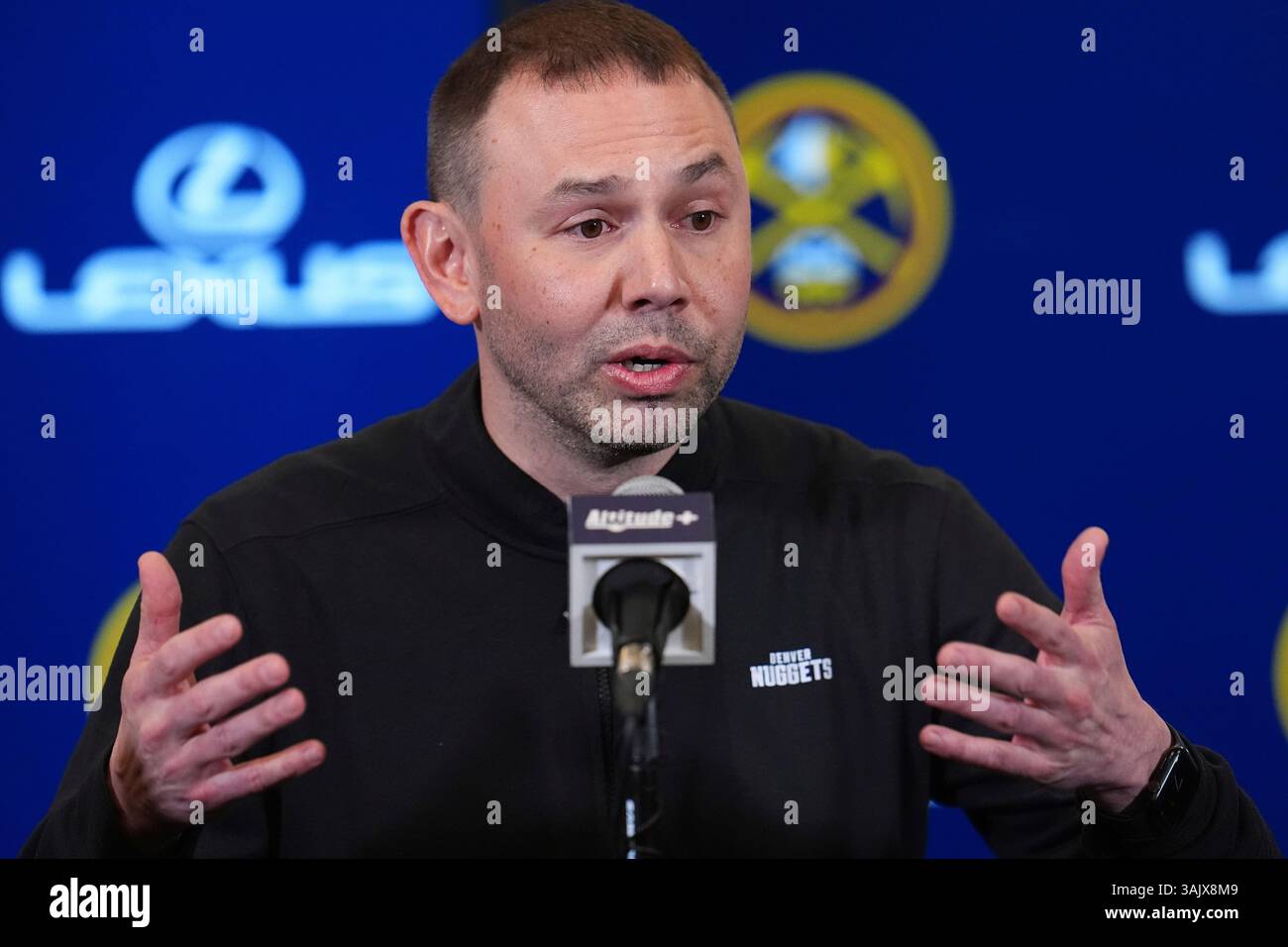 Denver Nuggets interim head coach David Adelman talks before an NBA ...